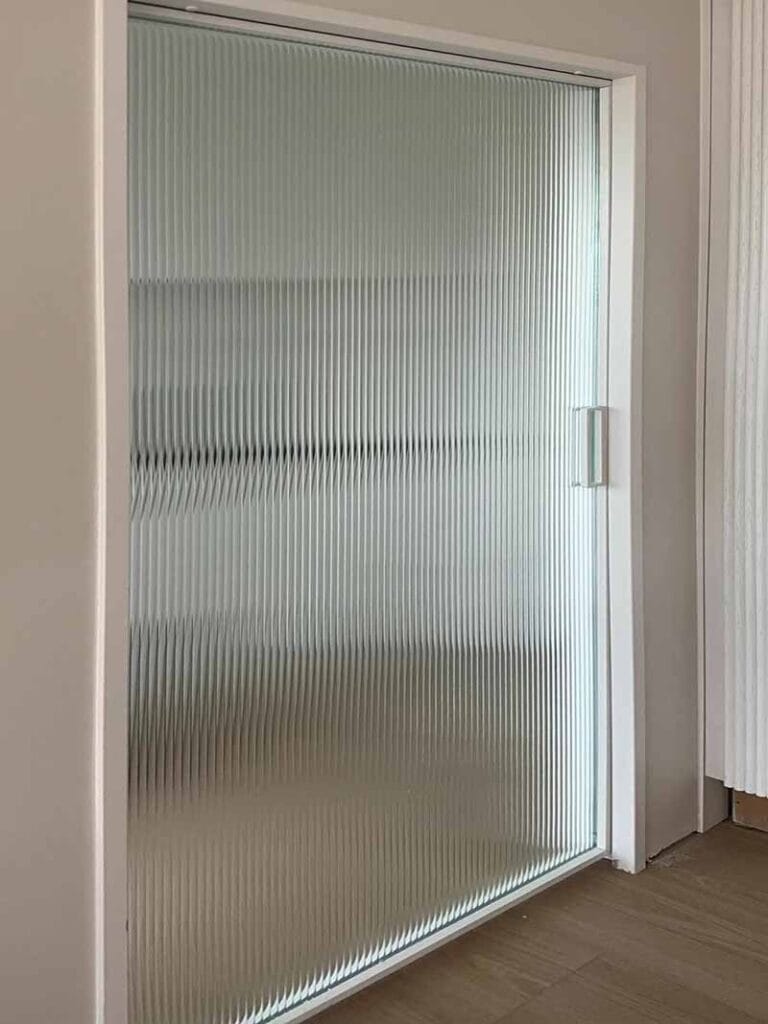 Black frame with opal laminated glass cavity sliding door - NOVA INTERIOR