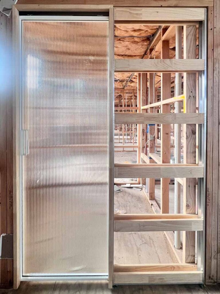 Black frame ultra-clear toughened glass cavity slider - NOVA INTERIOR