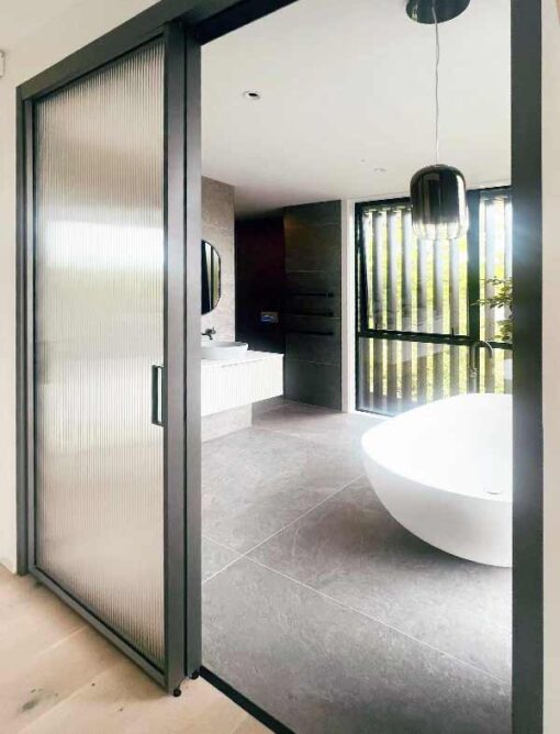 Premium top hung narrow reeded glass soft-stop sliding door - NOVA INTERIOR